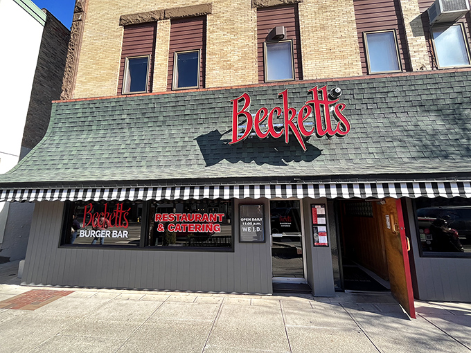 The classic brick fa&ccedil;ade and bold red signage of Beckett's stands as a beacon of comfort food excellence in downtown Bowling Green.