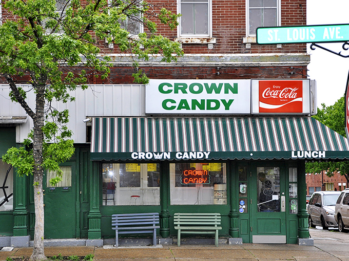 The classic green storefront of Crown Candy Kitchen stands as a time capsule on St. Louis Avenue, where nostalgia comes with a side of chocolate and conversation.