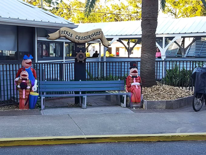 The nautical welcome squad stands at attention outside Dixie Crossroads, like friendly sentinels guarding the gateway to seafood nirvana.
