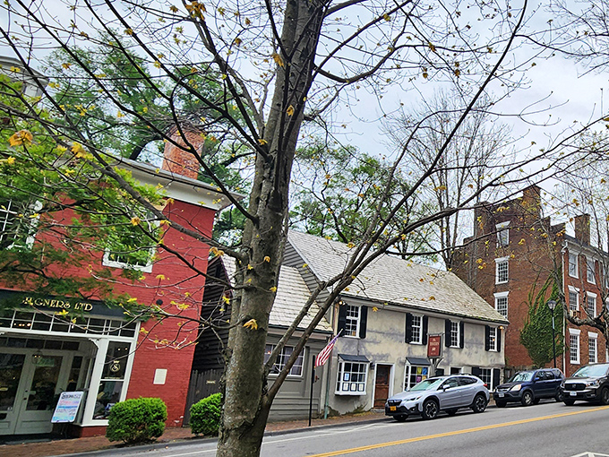 The Tavern's streetside presence whispers history while promising something special inside those weathered walls.