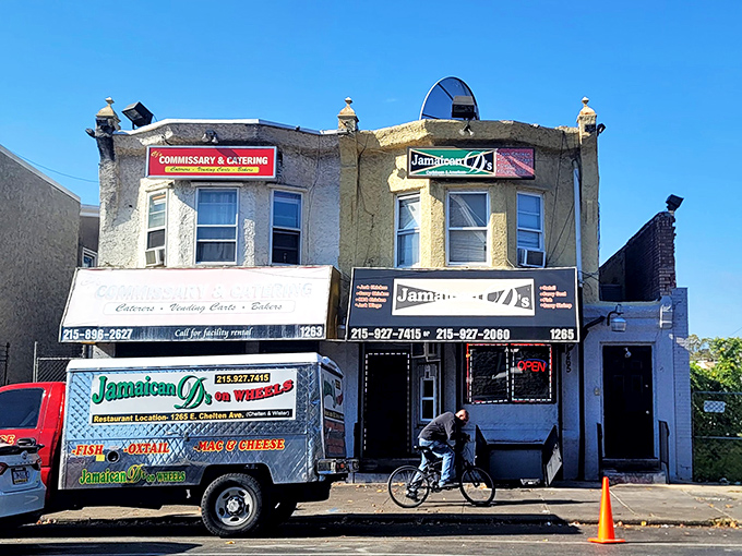 The unassuming storefront of Jamaican D's might not stop traffic, but trust me—what's cooking inside will stop you in your tracks. Caribbean paradise awaits!