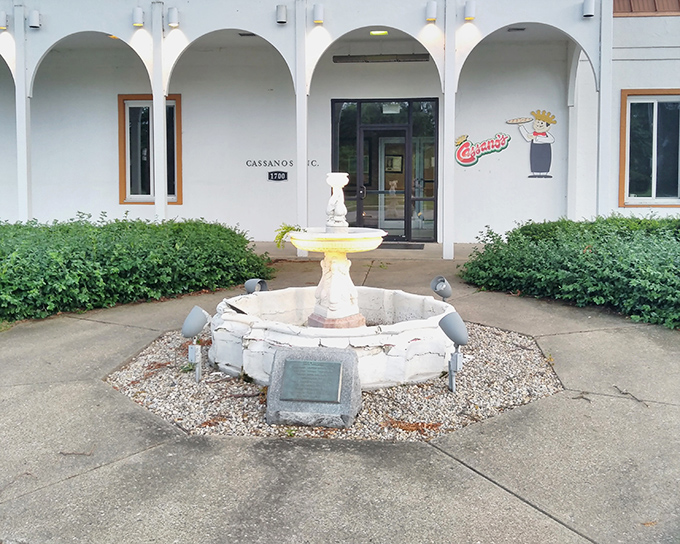A welcoming fountain greets pizza pilgrims at Cassano's Kettering location, like a royal courtyard for this self-proclaimed Pizza King.