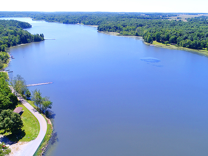 Aerial views rarely capture the soul of a place, but this bird's-eye perspective of Kiser Lake reveals its perfect horseshoe shape cradled by lush forests.