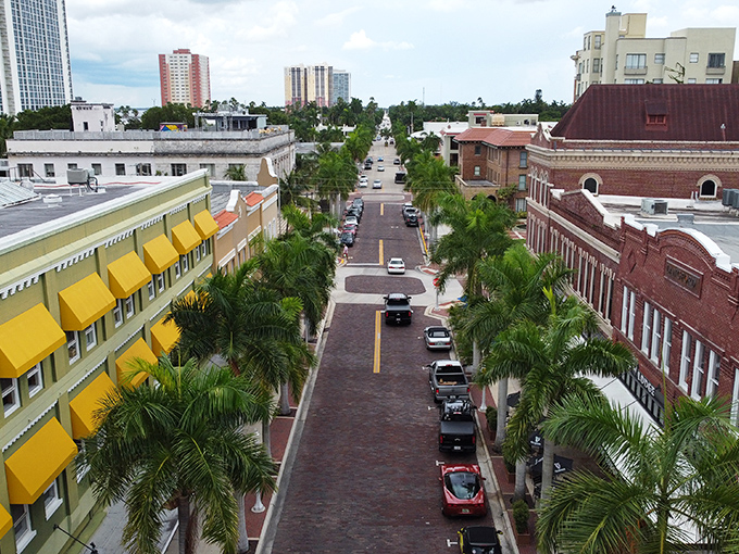 Downtown Fort Myers showcases its charming brick streets and royal palms, creating a postcard-perfect scene that whispers "affordable paradise."