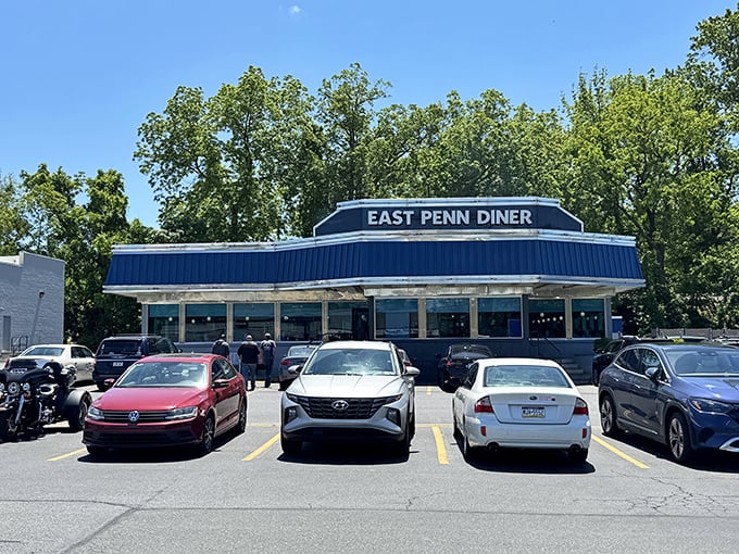 The iconic blue-roofed East Penn Diner stands proudly in Emmaus, its packed parking lot a testament to what awaits inside. Pennsylvania's answer to comfort food paradise.