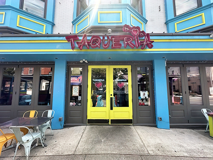 The turquoise and yellow fa&ccedil;ade of Taqueria Amor isn't just a restaurant entrance&mdash;it's a mood-lifting color therapy session that promises delicious things inside.