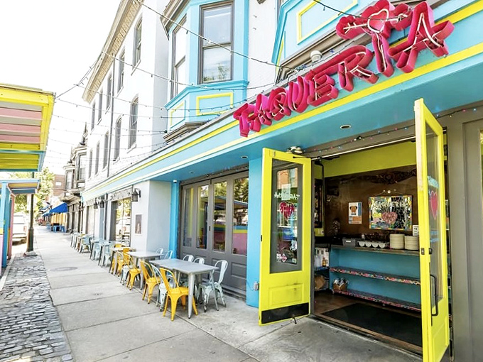 That turquoise and yellow facade isn't just eye-catching &ndash; it's a beacon calling hungry souls to taco paradise.