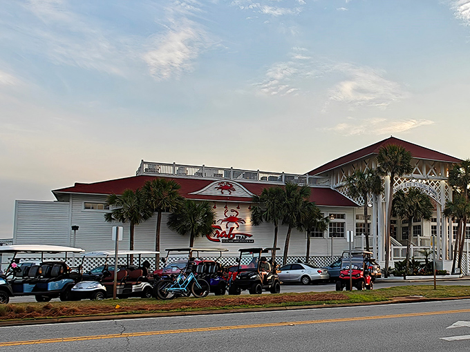 The Crab Trap's iconic red roof and white lattice trim stand out against Destin's blue skies like a beacon for hungry beachgoers.