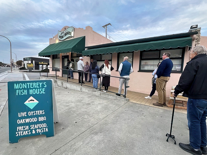 The unassuming exterior of Monterey's Fish House glows with promise at dusk, like a lighthouse beckoning hungry sailors to safe harbor.