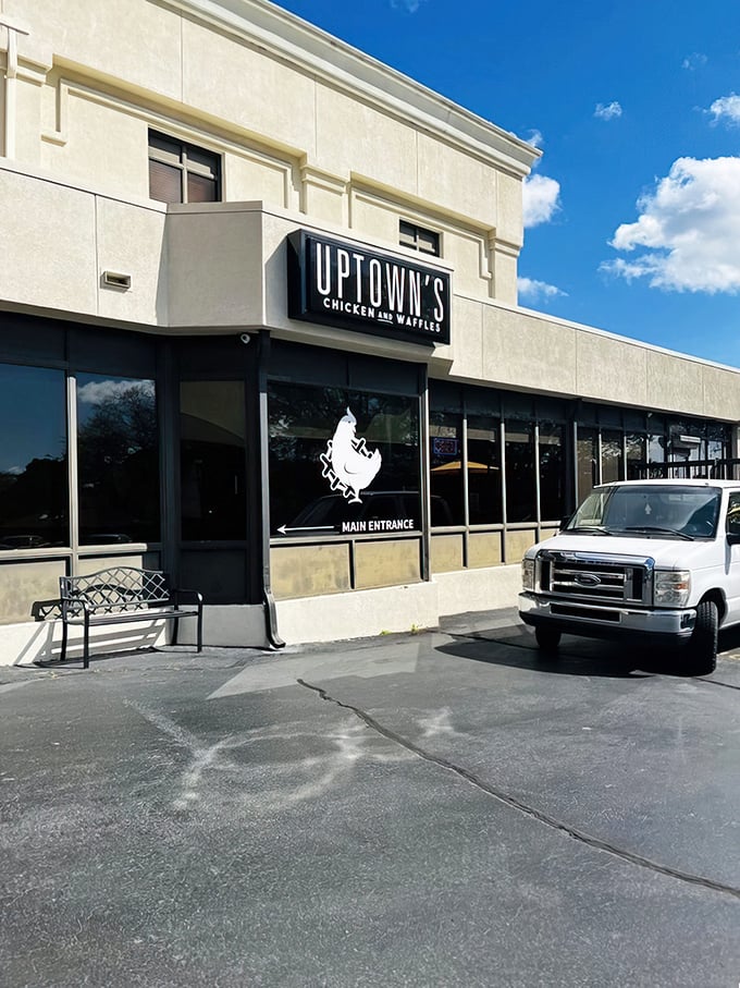 The unassuming exterior of Uptown's Chicken and Waffles stands like a temple of comfort food, promising delicious revelations within its modest walls.