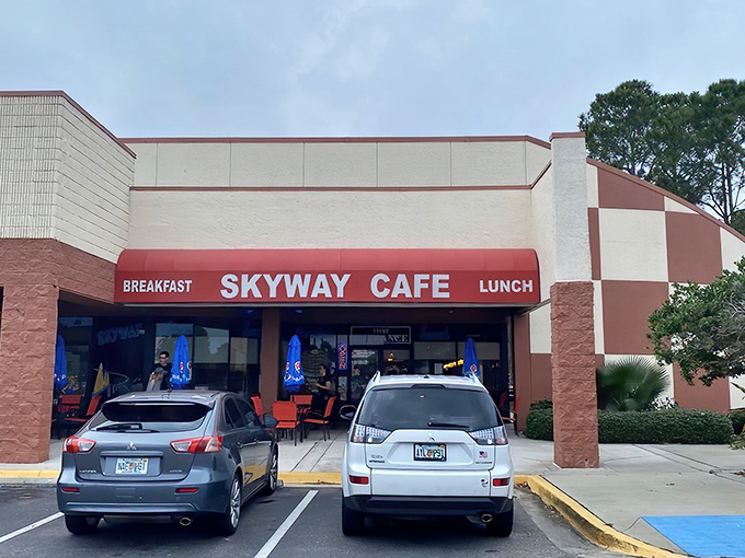 Morning sunshine highlights the simple storefront where Florida's flight enthusiasts and food lovers converge for their daily fuel.
