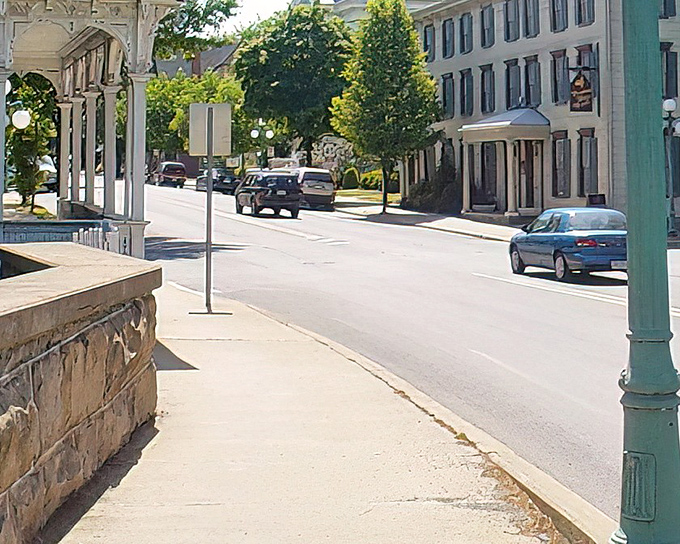 Tree-lined streets and historic buildings create Lewisburg's postcard-perfect setting, where traffic jams involve three cars waiting politely at a stop sign.