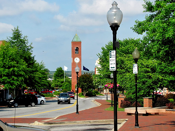 The iconic clock tower stands tall in downtown Spartanburg, keeping time for generations of locals who've never needed to rush anywhere anyway.