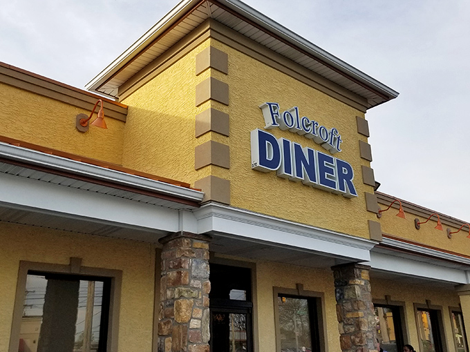 The bright yellow exterior of Folcroft Diner stands like a beacon of breakfast hope, promising comfort food salvation to hungry travelers across Pennsylvania.