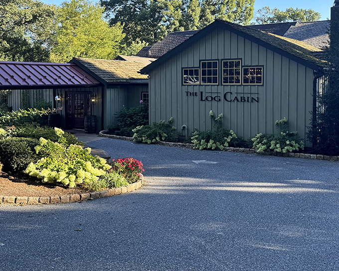 The unassuming sage-green exterior of The Log Cabin hides Pennsylvania's best-kept culinary secret, like finding a Rolex in a flannel shirt pocket.