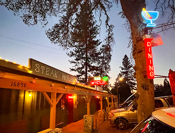 That neon glow isn't just a sign&mdash;it's a beacon of hope for hungry travelers seeking carnivorous salvation in the Sierra foothills.