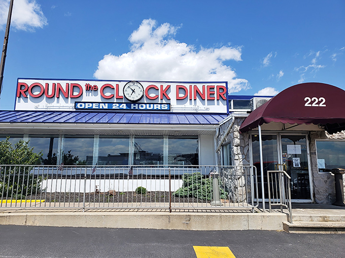 The blue-roofed beacon of breakfast bliss stands proudly on Route 30, promising 24-hour comfort that's worth setting your alarm for&mdash;or ignoring it completely.