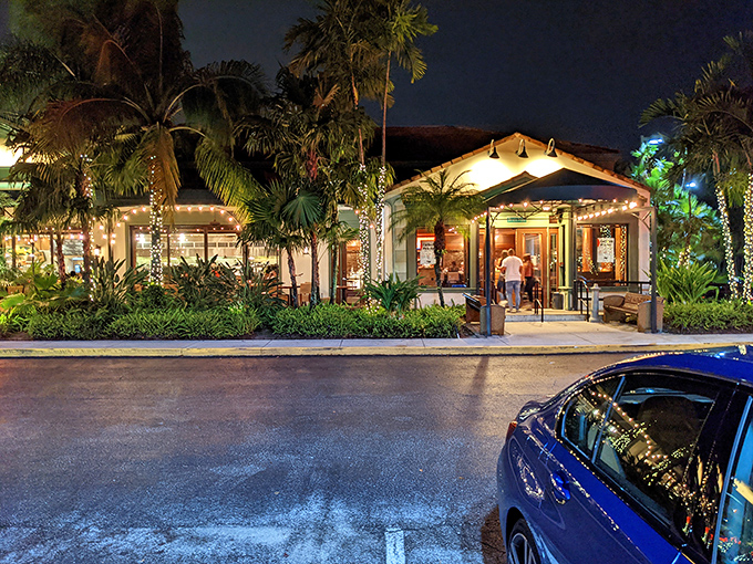Palm trees stand sentinel outside Bimini Twist, where Florida's tropical charm meets culinary excellence. The perfect prelude to seafood paradise.