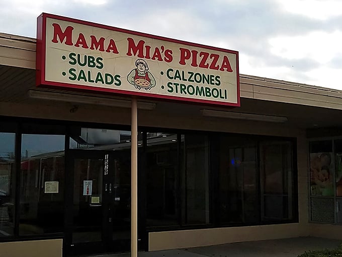 The unassuming storefront of Mama Mia's Pizza in Erie &ndash; where pizza pilgrimages begin and diet resolutions go to die.