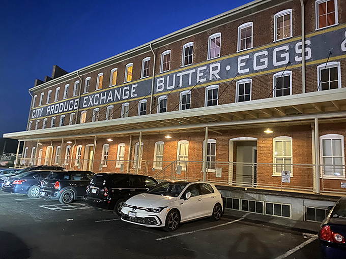 As night falls, the old produce exchange reveals its new identity—a temple to carnivorous delights where history and hunger happily collide.