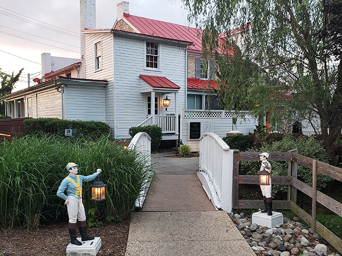 The historic white clapboard exterior with its distinctive red roof welcomes you like an old friend who happens to have the best steaks in town.