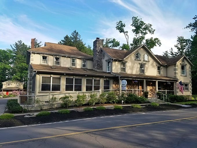 The charming converted country house exterior of Frogtown Chophouse promises culinary magic within its unassuming Pocono Mountain walls.