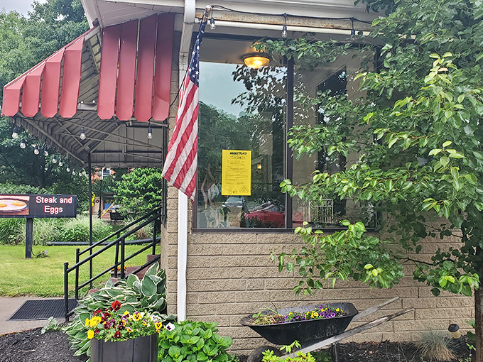 The unassuming exterior of The Diner beckons with its cheerful red umbrellas and lush planters&mdash;proof that culinary treasures often hide in plain sight.
