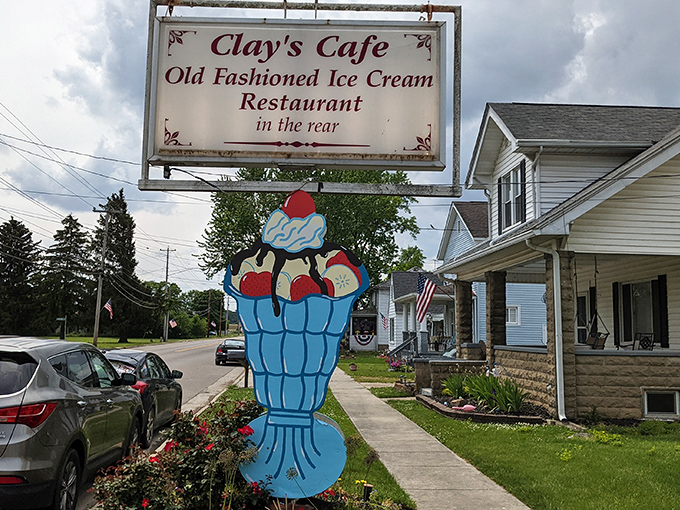 The welcoming patio at Clay's Caf&eacute; beckons with colorful umbrellas and hanging flower baskets. Small-town charm doesn't get more inviting than this. 