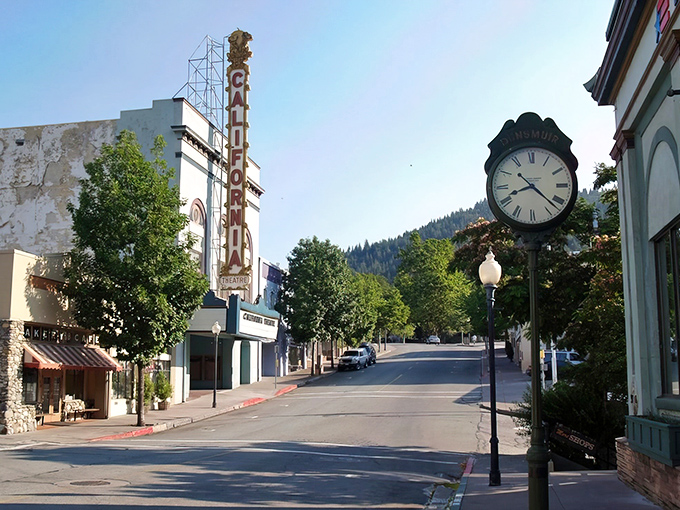 Downtown Dunsmuir's iconic California Theatre marquee stands tall against mountain backdrops, a nostalgic beacon in this railroad town where time slows deliciously.