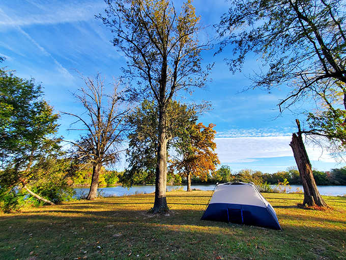 A tent pitched at sunset with the lake shimmering behind &ndash; nature's five-star accommodations without the pesky room service charges.