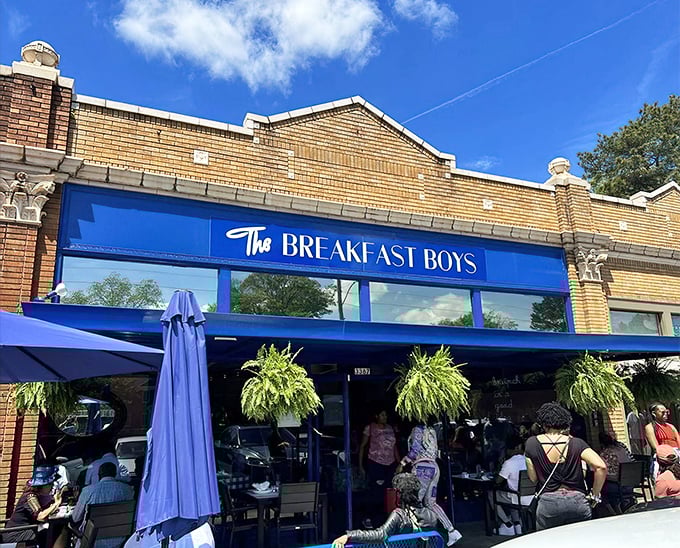 The bright blue awning of The Breakfast Boys stands out like a culinary beacon, promising morning delights that'll make hitting the snooze button your biggest regret.