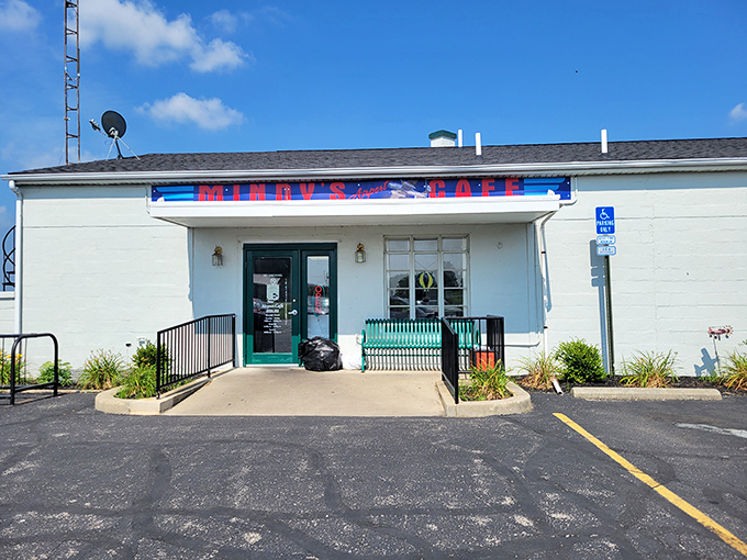 The unassuming exterior of this Cafe promises no frills, just honest-to-goodness food that'll make your taste buds request clearance for takeoff.