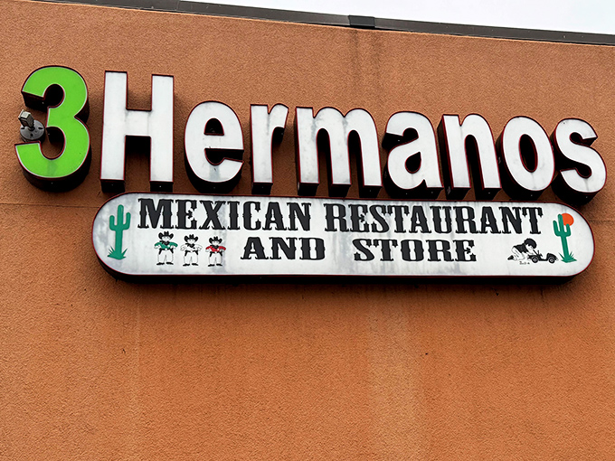 The bright green "3" pops against the warm terracotta exterior, like a beacon calling hungry travelers home to authentic Mexican flavors.