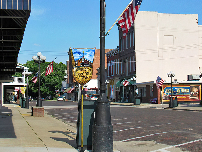 Downtown Arcola proudly displays its "America's Broom Town" golden emblem, a quirky claim to fame that sweeps visitors off their feet. 