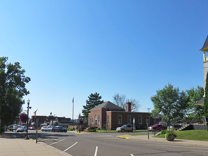 Downtown Hayward greets visitors with classic small-town charm, where brick buildings stand proudly under Wisconsin's impossibly blue skies.
