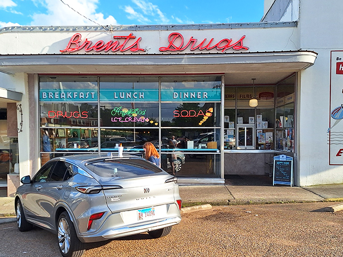 The neon glow of Brent's Drugs beckons like a time portal to simpler days, when milkshakes were hand-spun and conversations happened face-to-face.
