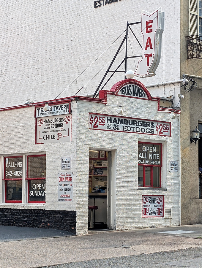 The iconic white exterior of Texas Tavern stands like a time capsule in downtown Roanoke, beckoning hungry visitors with its vintage charm.