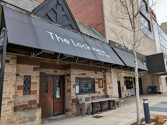 The stone facade of The Lockview stands like a humble guardian of grilled cheese greatness in downtown Akron, its understated awning promising comfort without pretension.