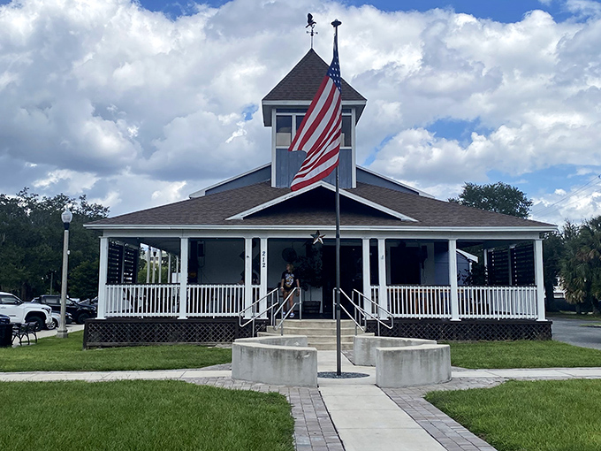 Historic charm meets culinary adventure at Henry's Depot, where that American flag isn't just waving—it's practically beckoning you to come taste what's inside.