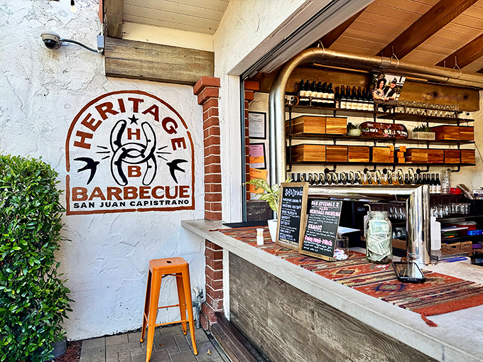 The Spanish-style facade of Heritage Barbecue welcomes hungry pilgrims with the promise of smoky salvation. That line? Consider it the appetizer to your meat feast.