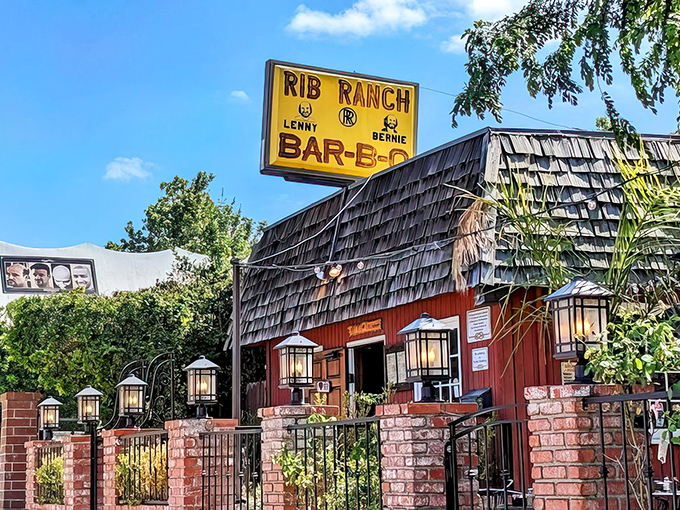 Bathed in California sunshine, this barbecue haven's weathered wood and brick facade promises authentic flavors that no trendy downtown spot could ever replicate.
