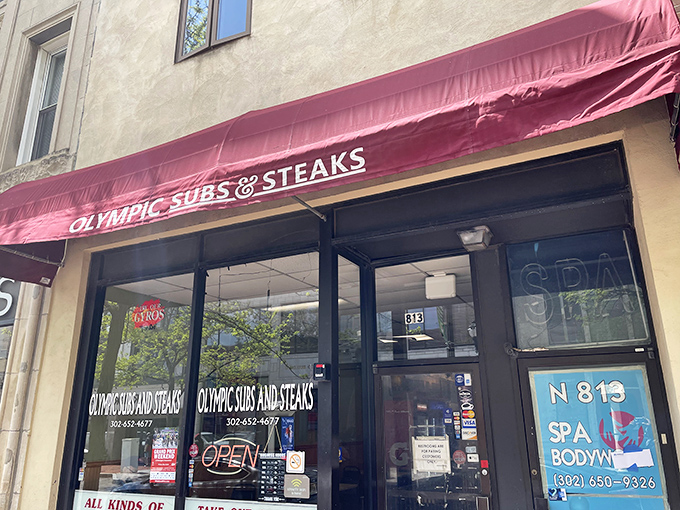 The iconic red awning of Olympic Subs & Steaks stands out like a beacon of hope for the sandwich-deprived masses of Wilmington.