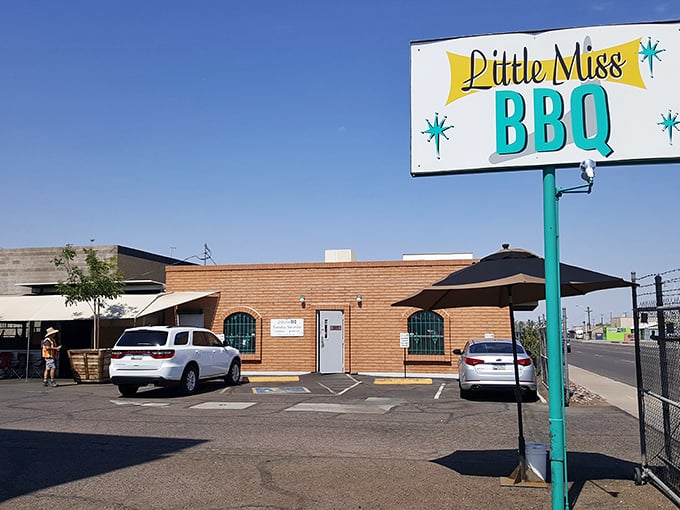 That iconic turquoise and yellow sign is like a beacon for barbecue pilgrims. In Phoenix's sea of restaurants, this signal flare guides hungry travelers home.