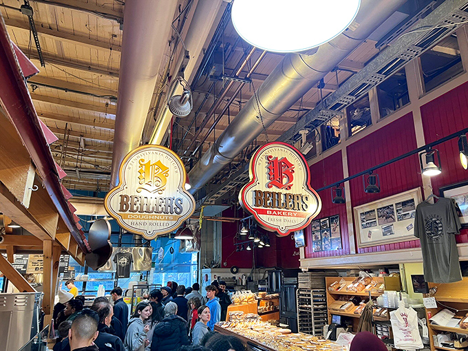 The iconic Beiler's signs hang like beacons of hope for the donut-deprived. This bustling corner of Reading Terminal Market promises sweet salvation.