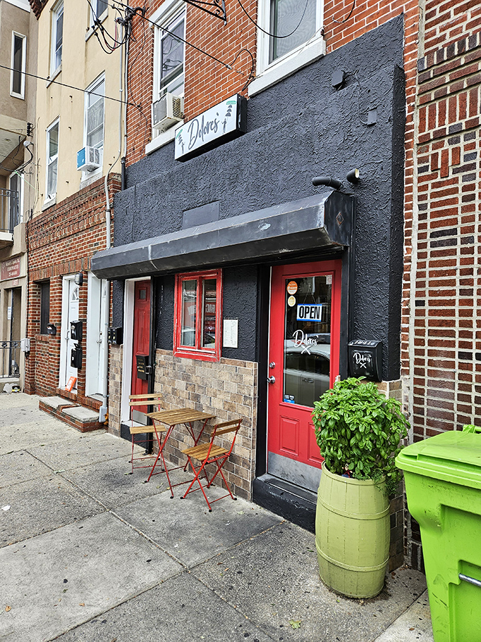 A classic Philadelphia storefront with character to spare &ndash; that pop of red against the black facade is like a culinary stop sign saying "You'd be crazy to pass this up."