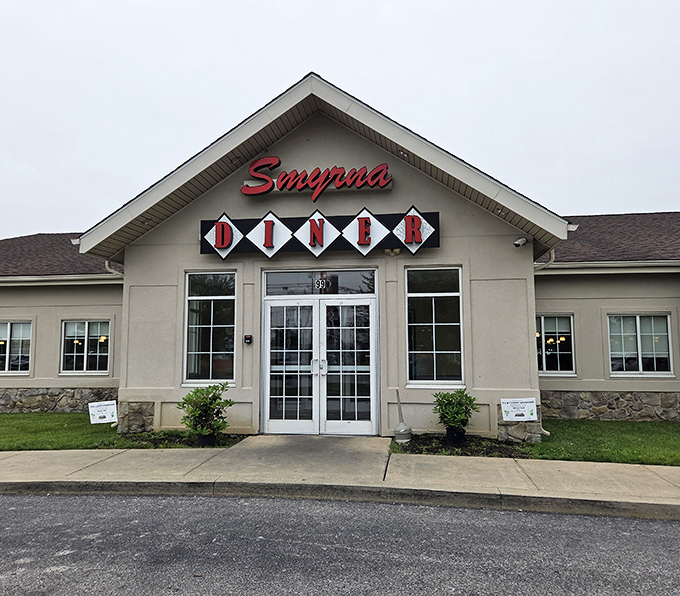 The classic red script against beige siding announces your arrival at breakfast paradise. Smyrna Diner stands ready to welcome hungry travelers and locals alike.