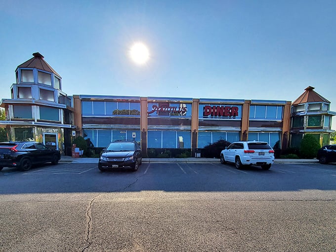 The Nautilus Diner stands proudly against the Maryland sky, its distinctive architecture beckoning hungry travelers like a lighthouse for the famished.