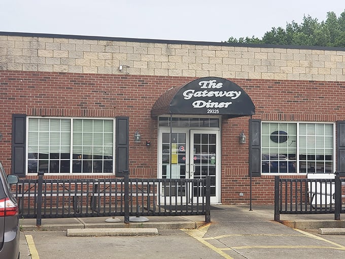 The unassuming brick exterior of The Gateway Diner proves once again that culinary treasures often hide behind modest facades.