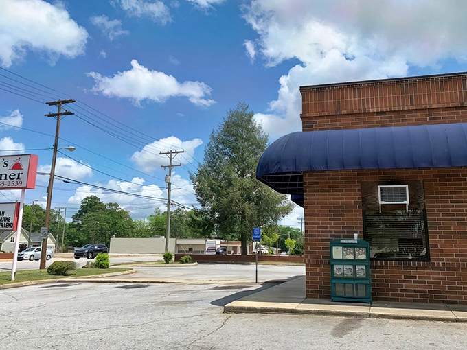Brick exterior with that signature blue awning – the culinary equivalent of judging a book by its unassuming cover and finding a masterpiece inside.