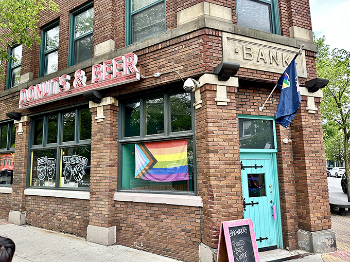 What was once a bank now safeguards something far more valuable: a treasure trove of craft beer and artisanal donuts behind that eye-catching turquoise door.